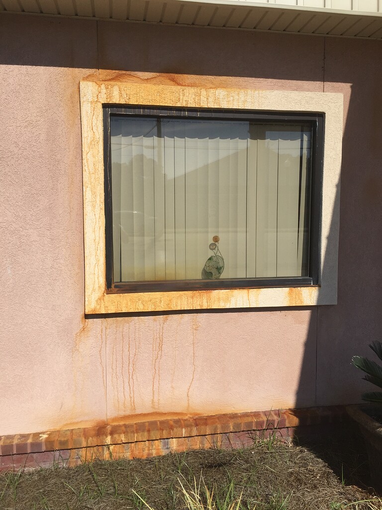Rust on Stucco and Window - Residential - Pressure Washing Resource
