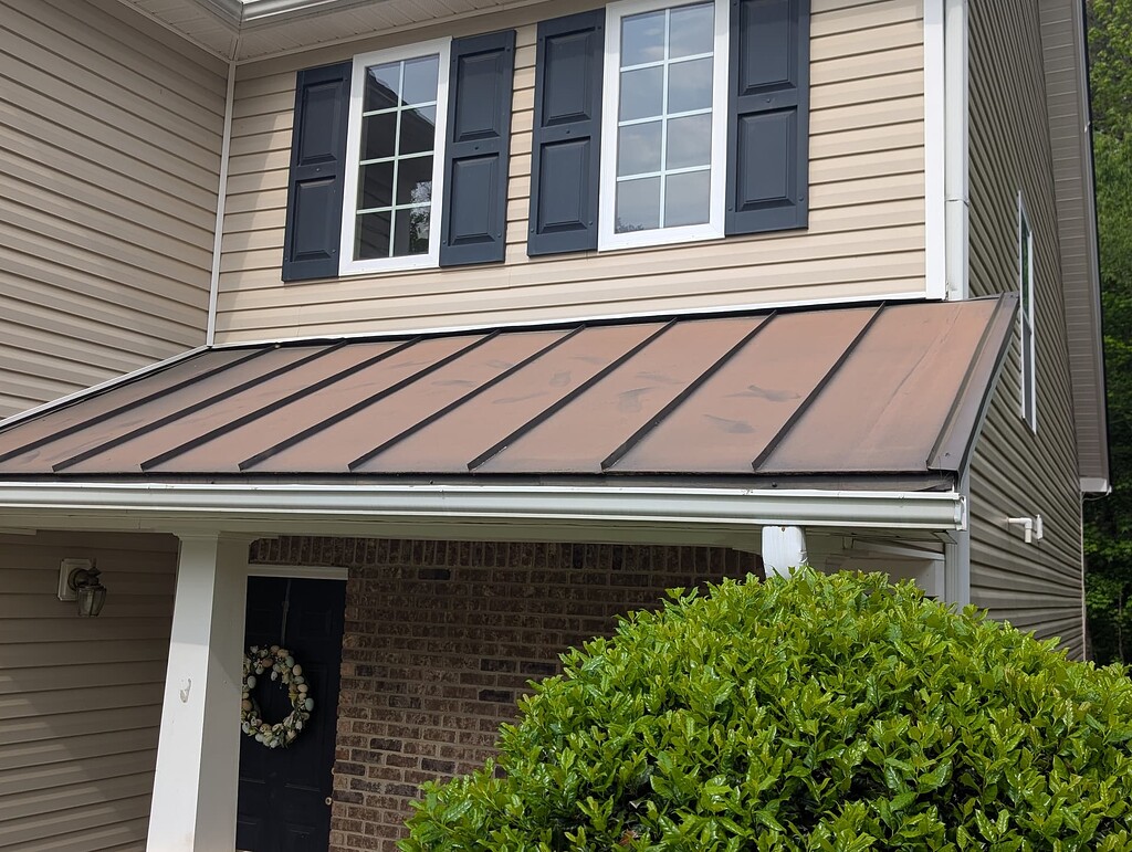 Metal Roof. Orangish coating + Footprints from Santa? Rust or Oxidation ...